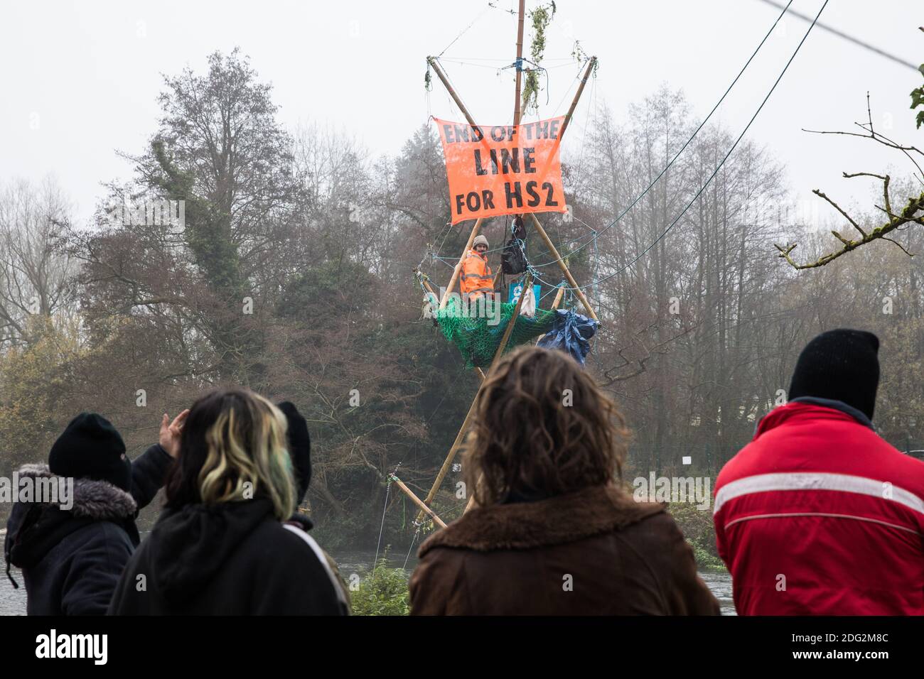 Denham, UK. 7th December, 2020. Anti-HS2 activists observe Dan Hooper ...