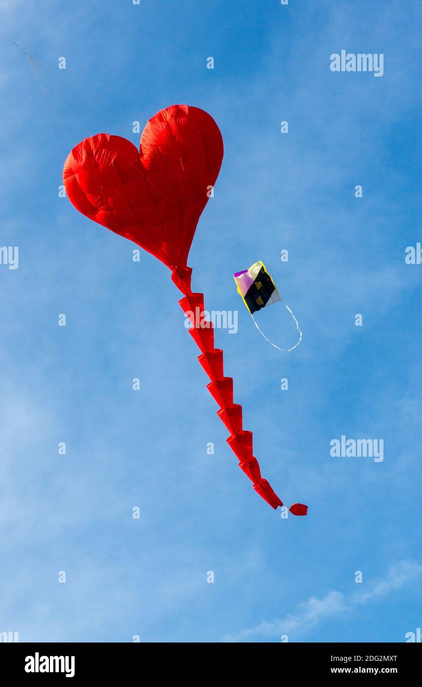 Red heart shaped kite Stock Photo - Alamy