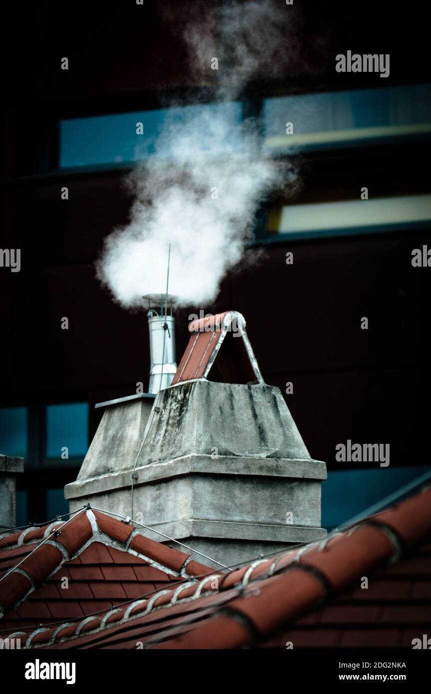 House and chimney smoke hi-res stock photography and images - Alamy