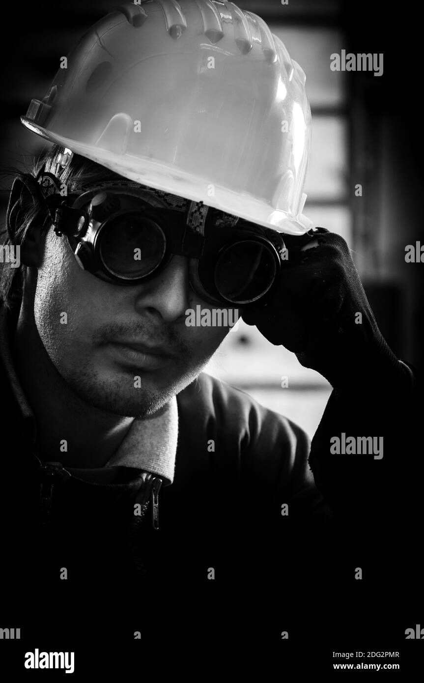 Working hard man hi-res stock photography and images - Alamy