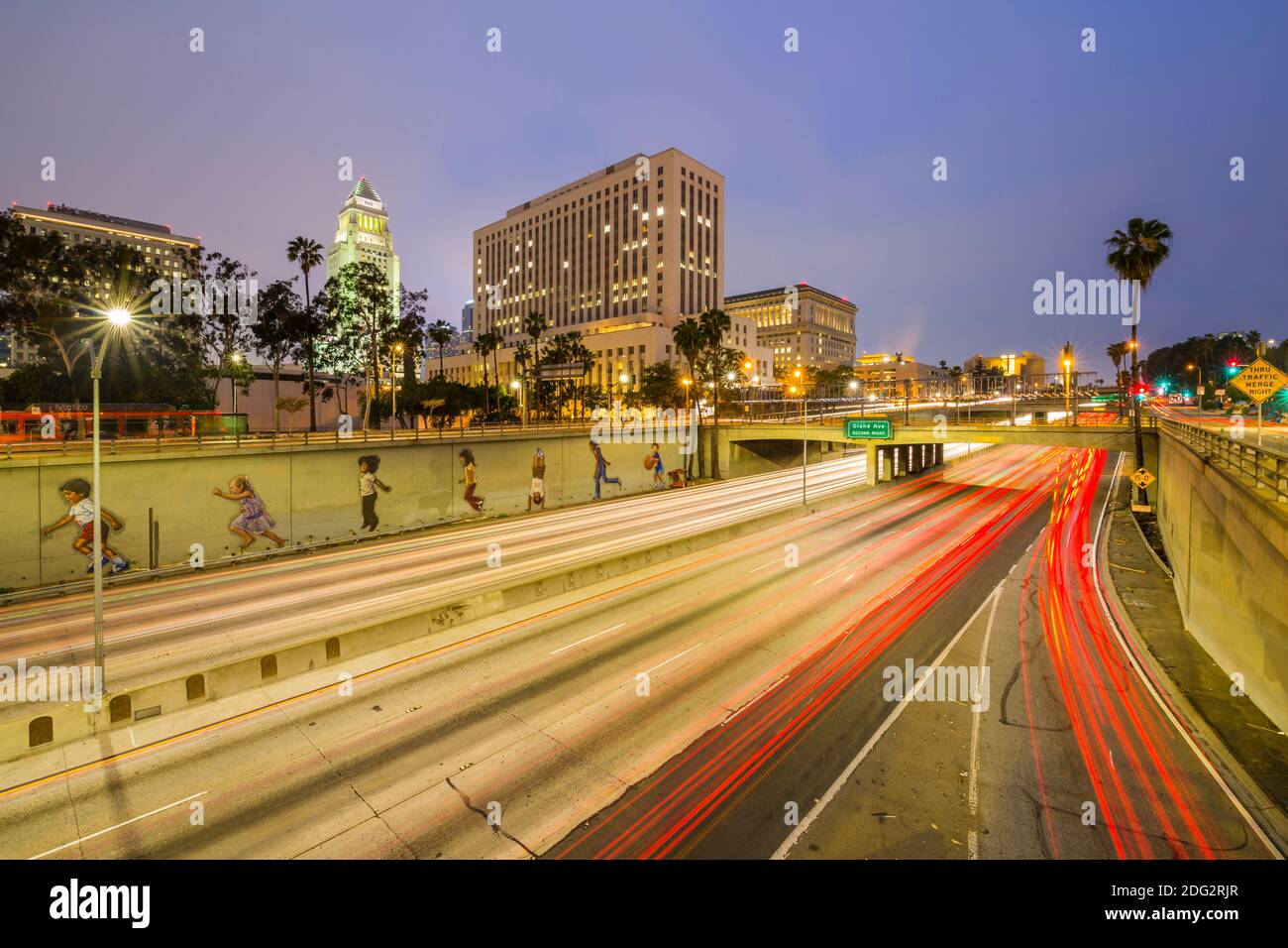 City Hall and Highway 101 running through Downtown at dusk, Los Angeles ...