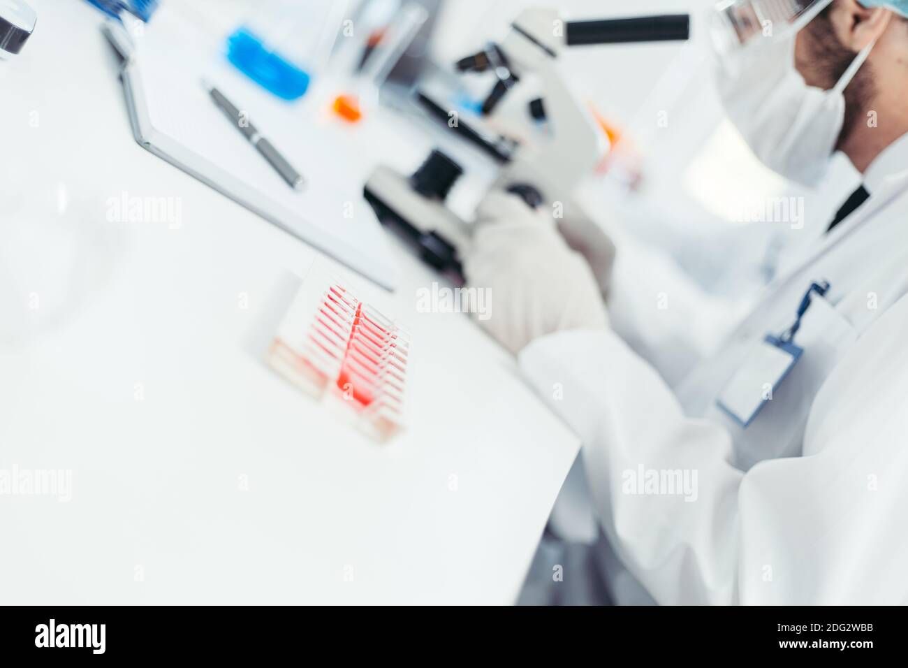 blurry image of a desktop in a medical laboratory Stock Photo - Alamy