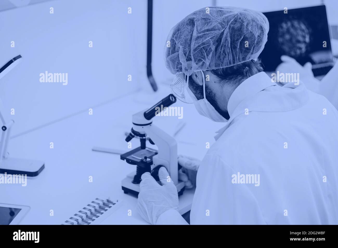 close up. scientist using a microscope in the laboratory Stock Photo ...