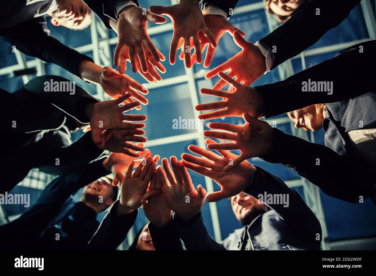close up. young business team standing in a circle Stock Photo - Alamy