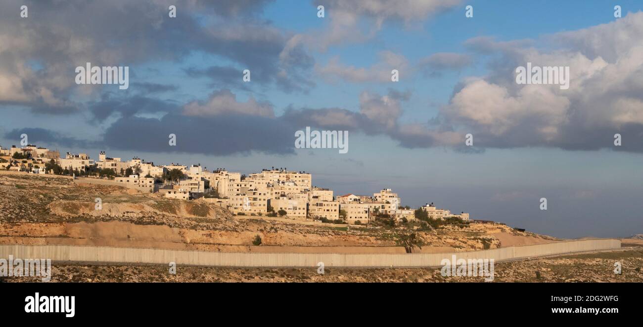 View of the West Bank separation barrier built by Israel surrounding ...