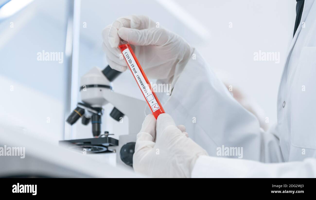close up. laboratory employee sitting at the laboratory table Stock ...