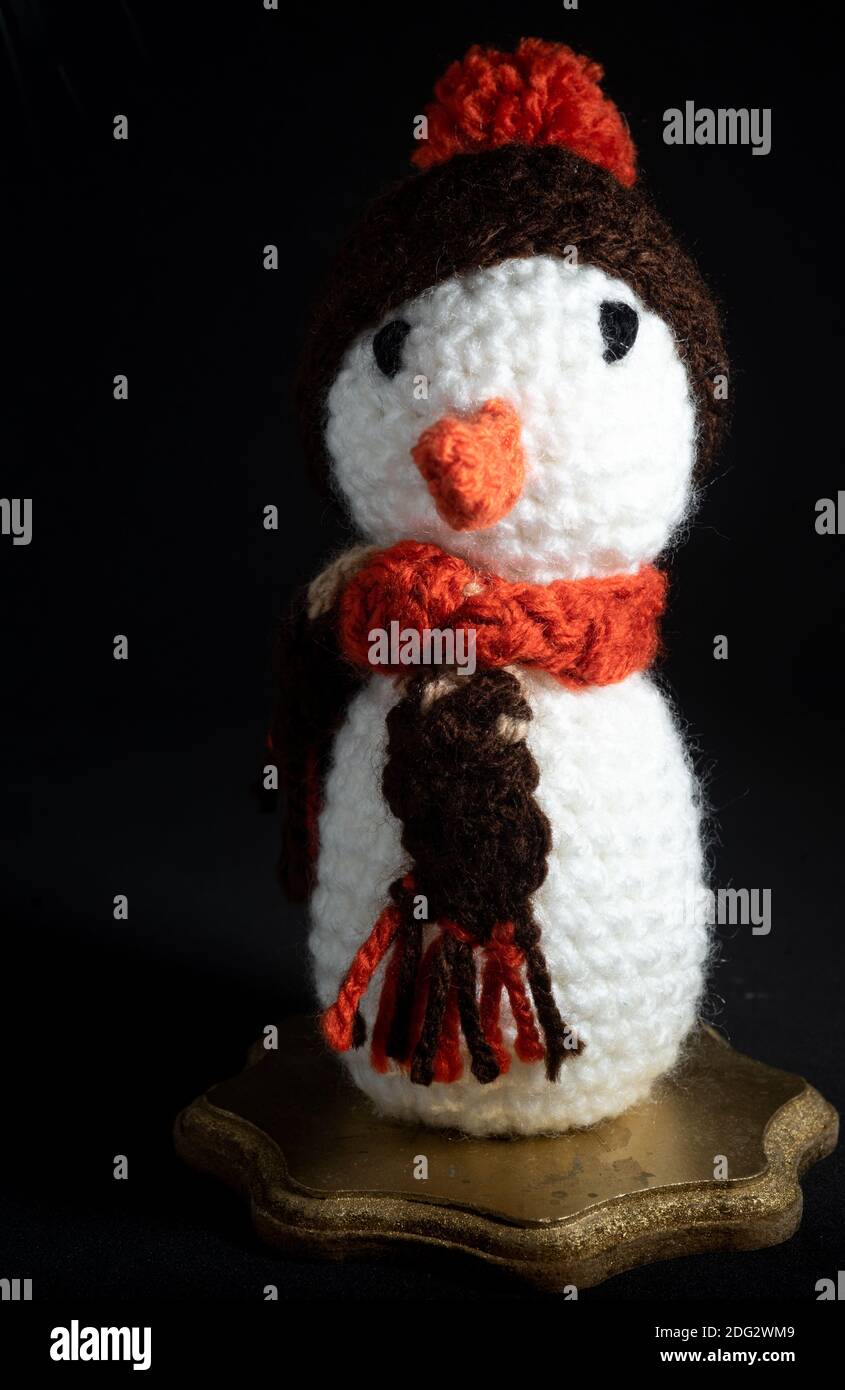 Close up of a Homemade Yarn Snowman worsted, stay home Christmas covid ...