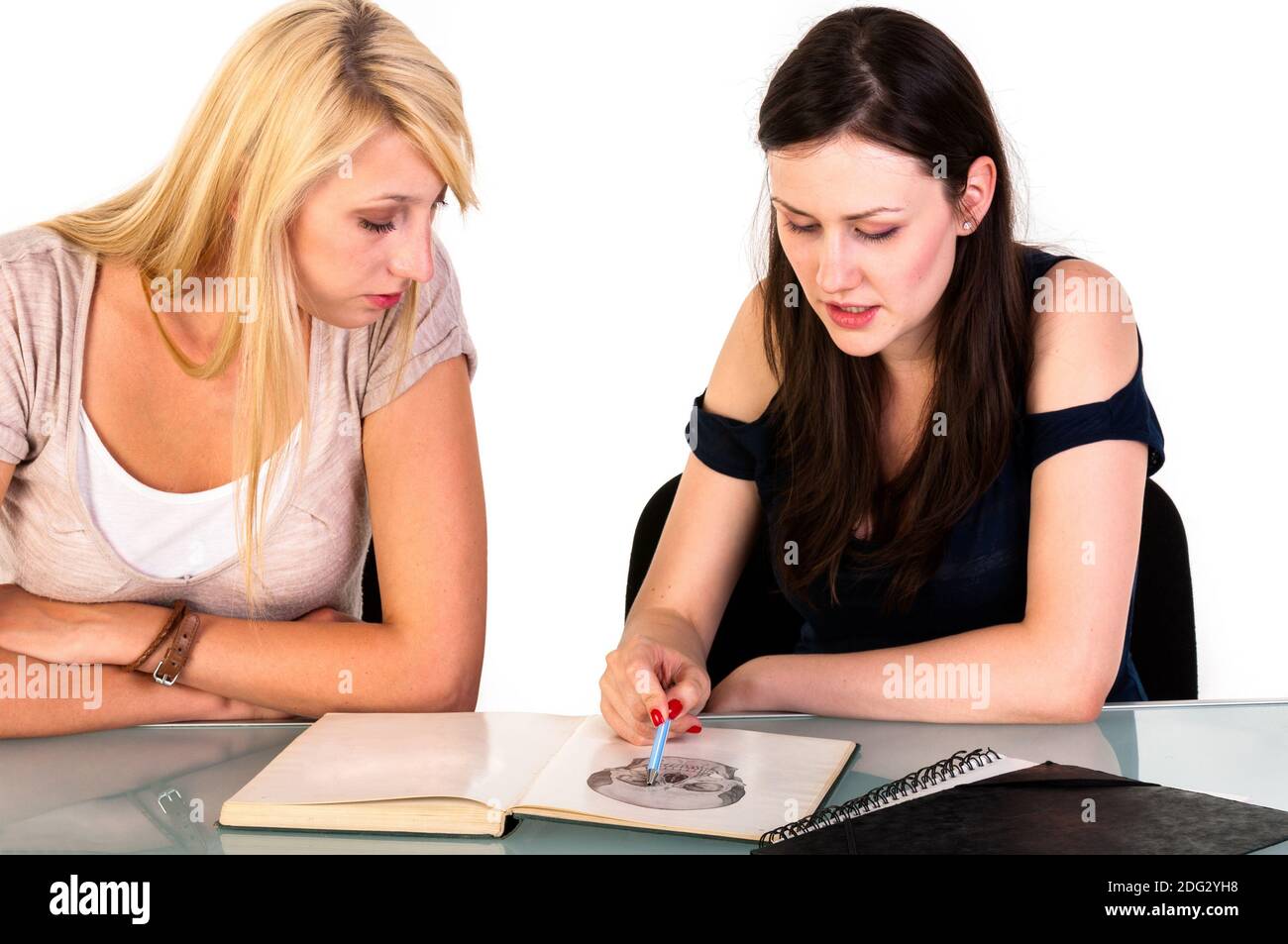 Two beautiful student girls getting ready for school isolated Stock ...