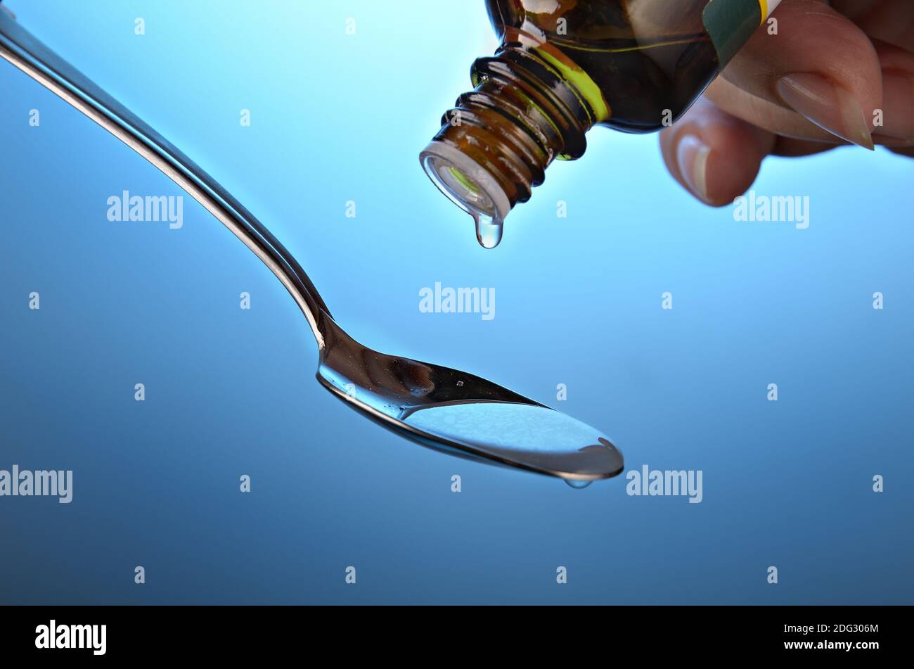 Blue medicine bottle with dropper hi-res stock photography and images ...