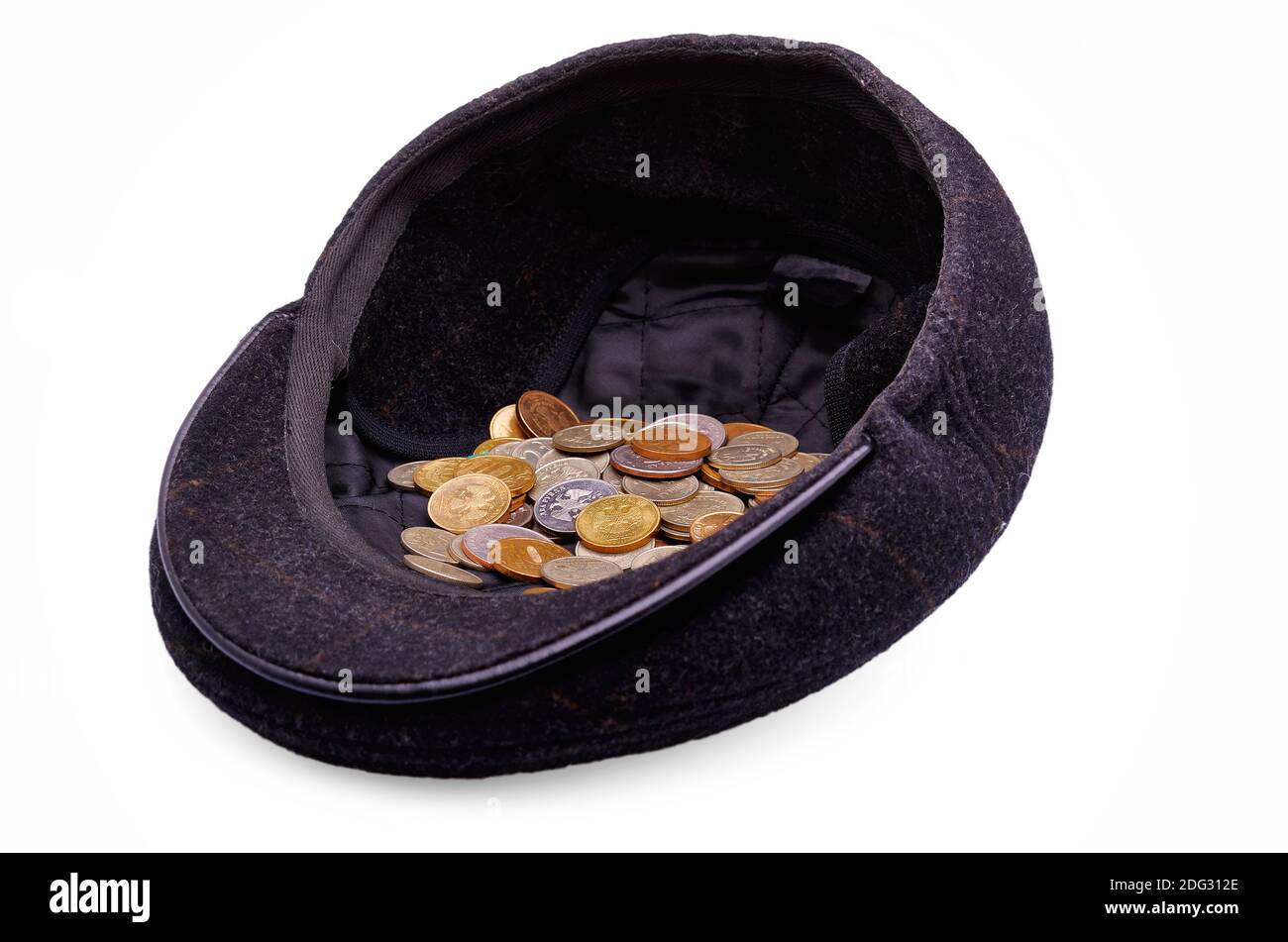 Coins in a cap Stock Photo - Alamy