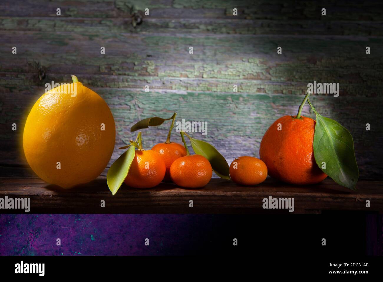 Bunch of Citruses In Sharp Light on Shelf. Lemon, Three Citrus ...