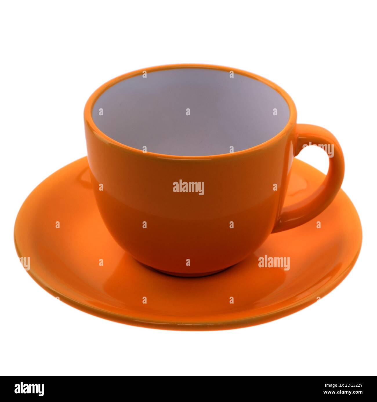 Orange cup and saucer Stock Photo - Alamy
