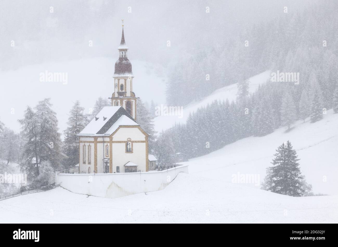 Snow covered Church St. Niklas, Tyrol Stock Photo - Alamy