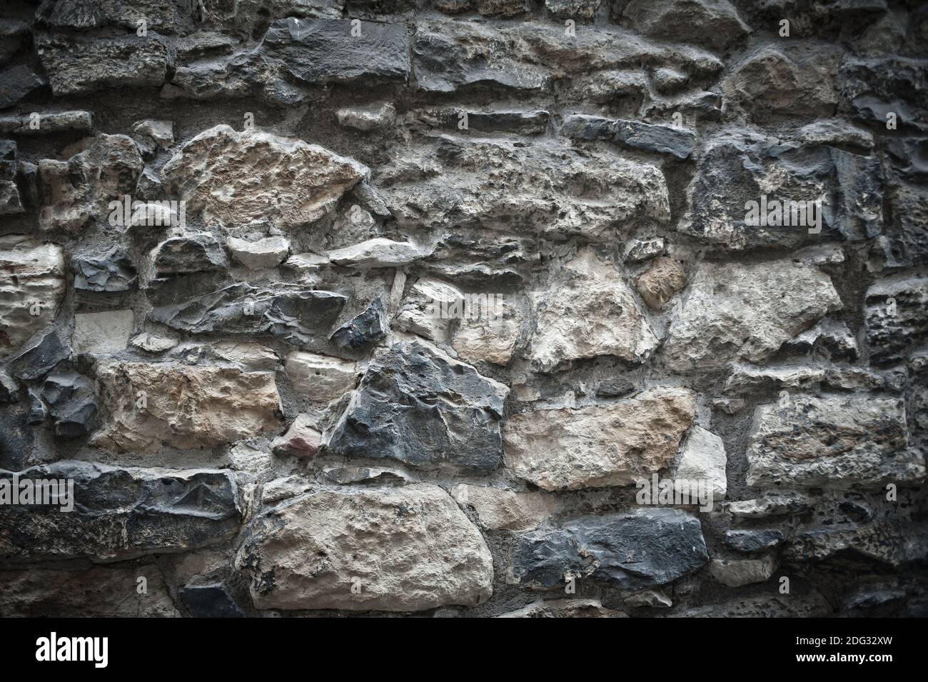 dramatic texture of old stone european house wall Stock Photo - Alamy