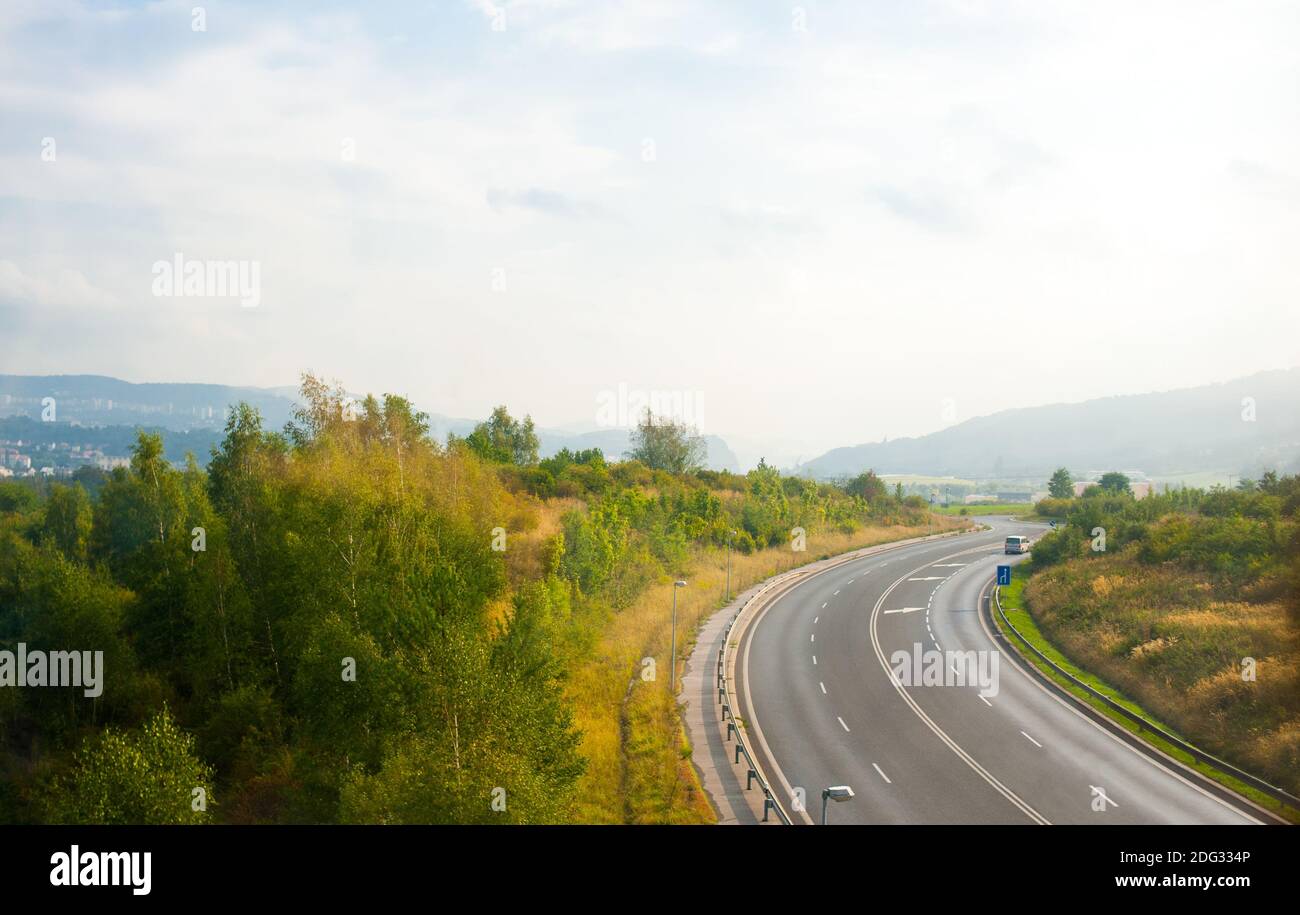 View on a road in Germany in sunset light Stock Photo - Alamy