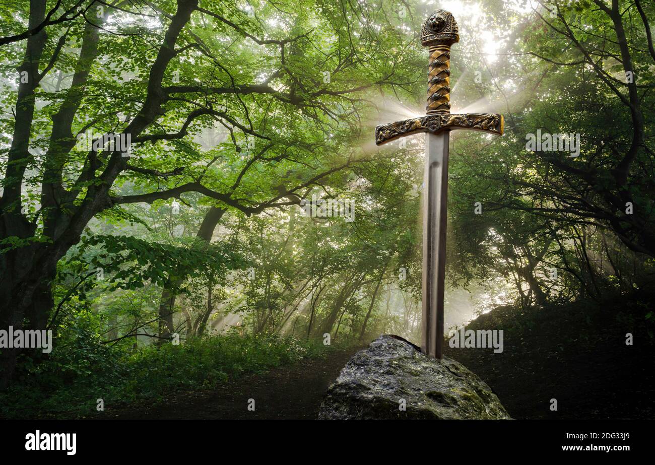 Excalibur, the mythical sword in the stone of King Arthur Stock Photo ...