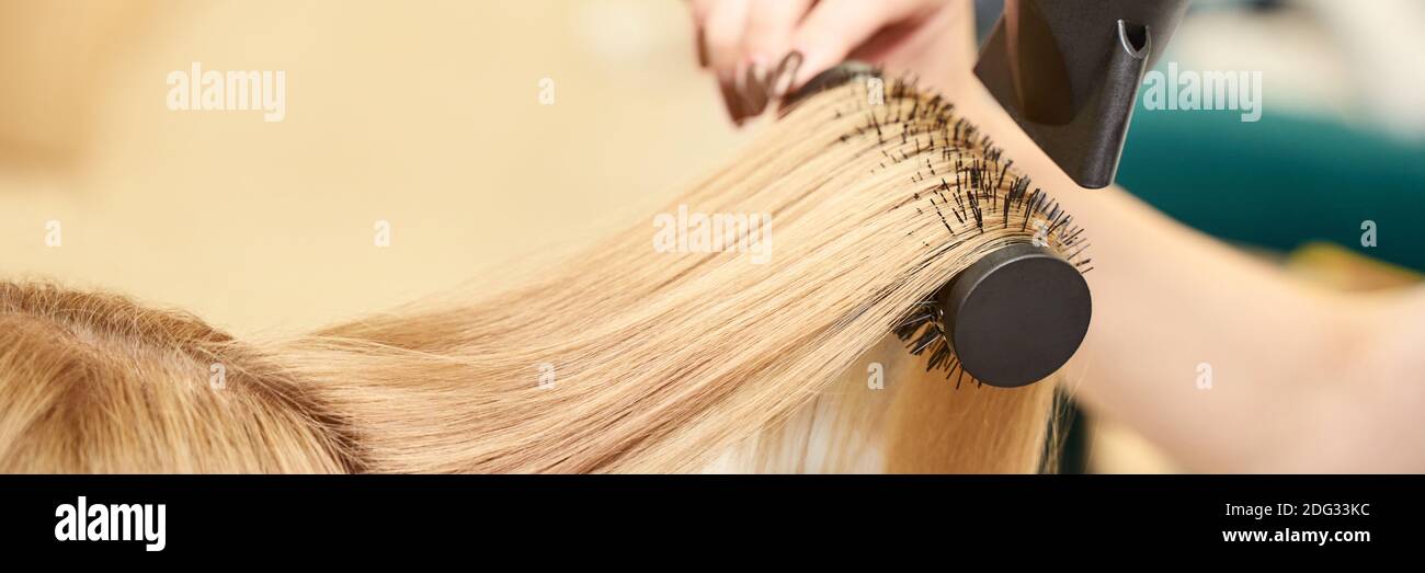 Repair hair procedure. Haircut at salon. Woman hairstyle Stock Photo ...