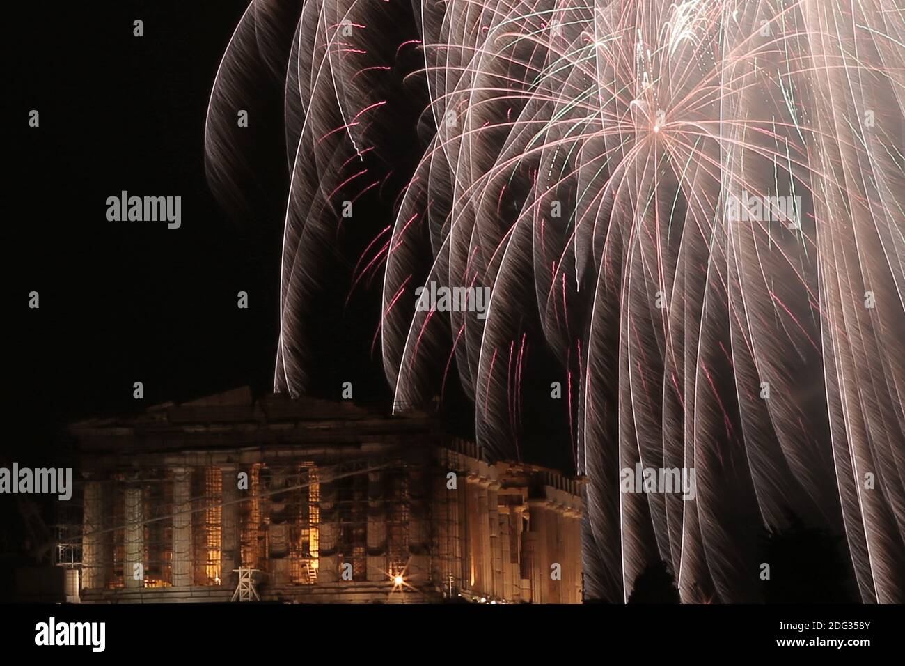 Fireworks explode over the Parthenon temple atop the Athens Acropolis ...