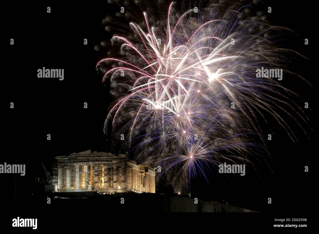 Fireworks explode over the Parthenon temple atop the Athens Acropolis ...