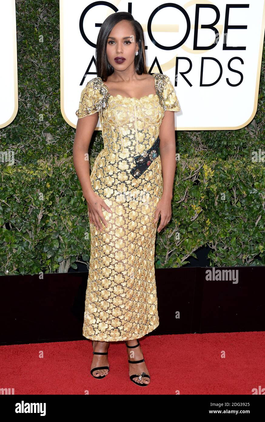 Kerry Washington in gold lace tea-length Dolce & Gabbana attends the ...