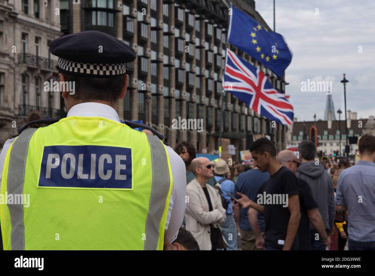 Metropolitan police officer overlooking a crowd of pro-European ...