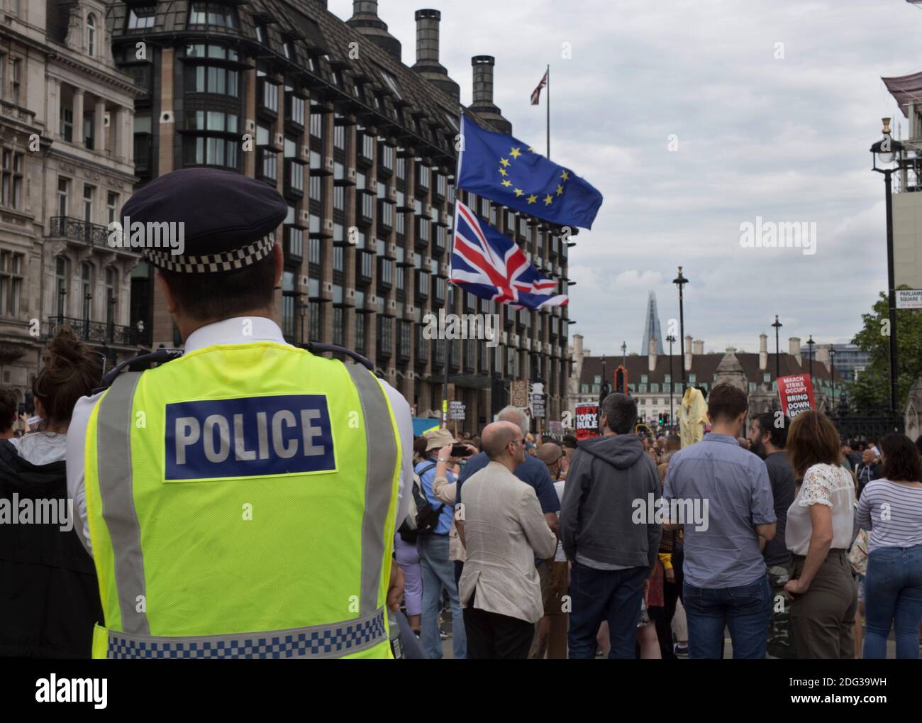 Metropolitan police officer overlooking a crowd of pro-European ...