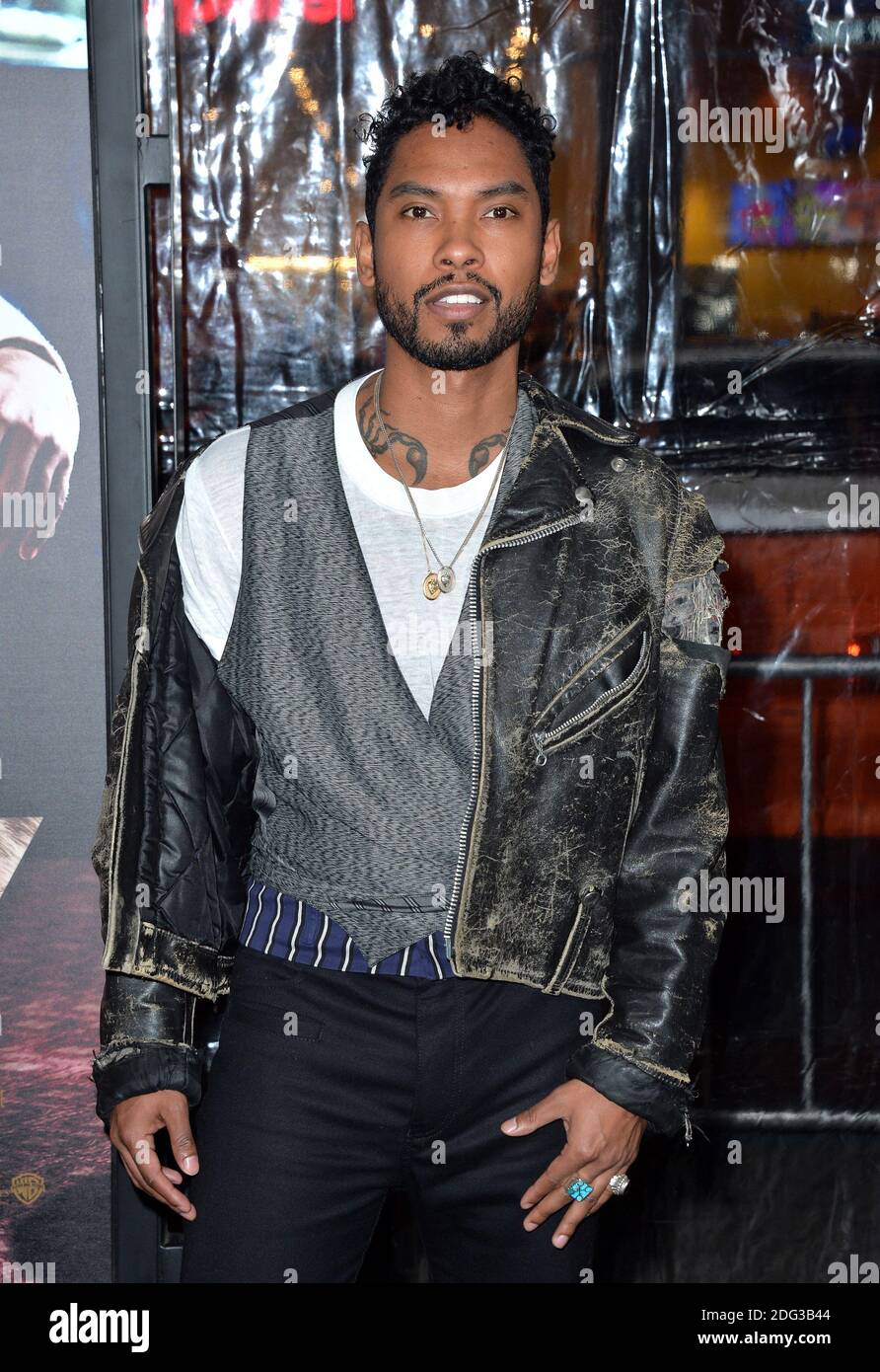 Miguel attends the premiere of Warner Bros. Pictures Live By Night at ...