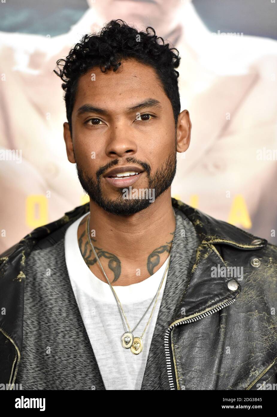 Miguel attends the premiere of Warner Bros. Pictures Live By Night at ...