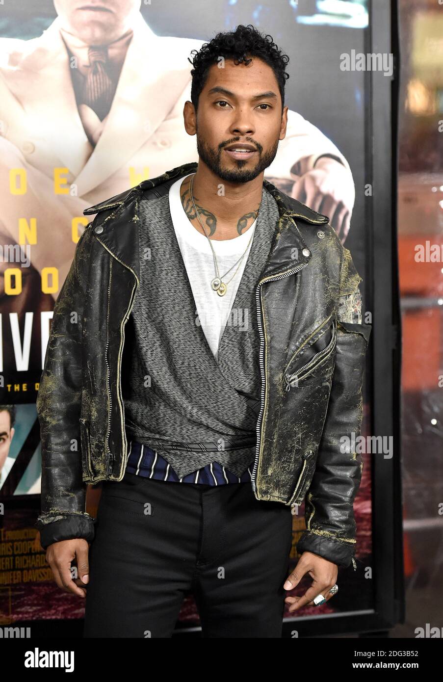 Miguel attends the premiere of Warner Bros. Pictures Live By Night at ...