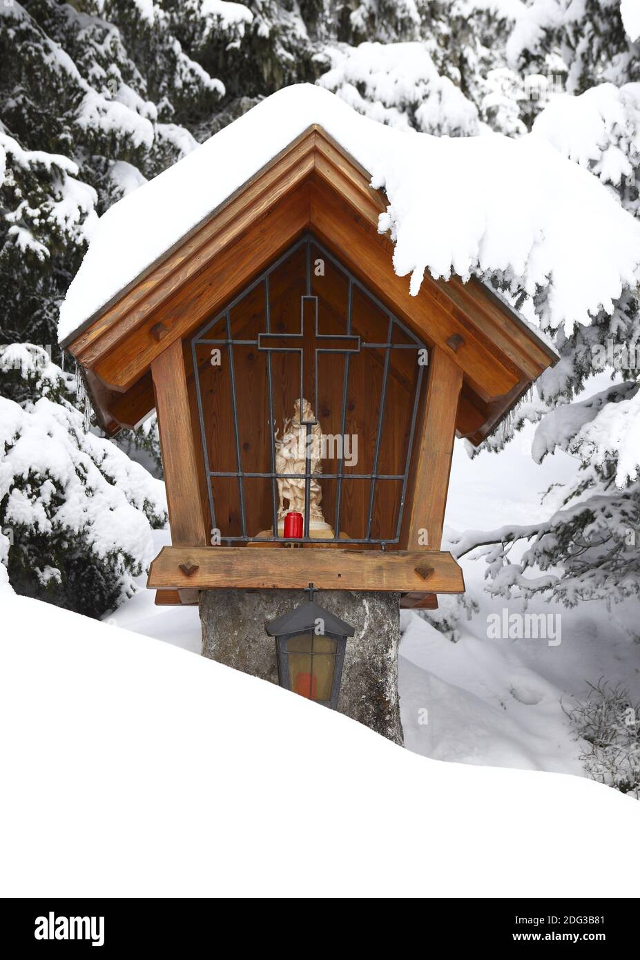 Cross covered with snow hi-res stock photography and images - Alamy