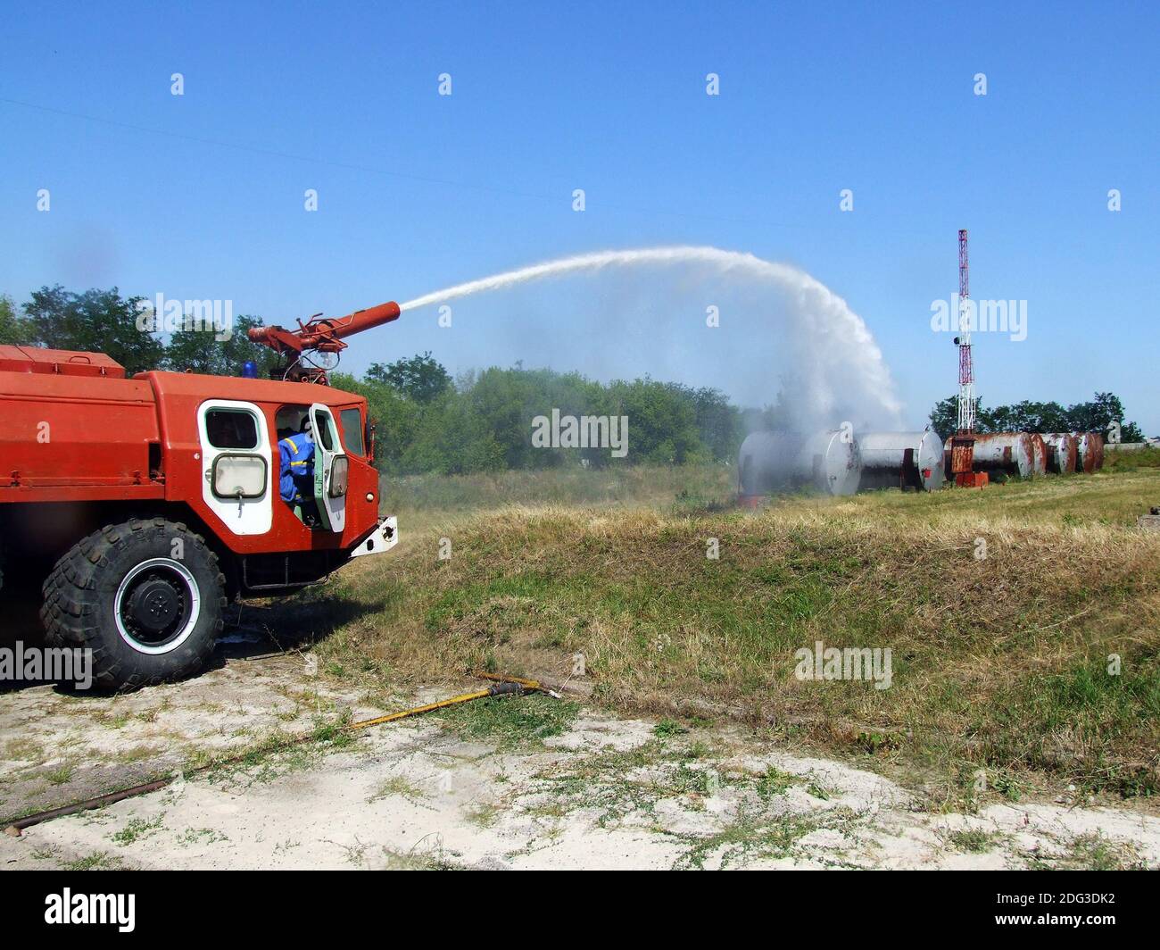 Man fire extinguishing hi-res stock photography and images - Alamy