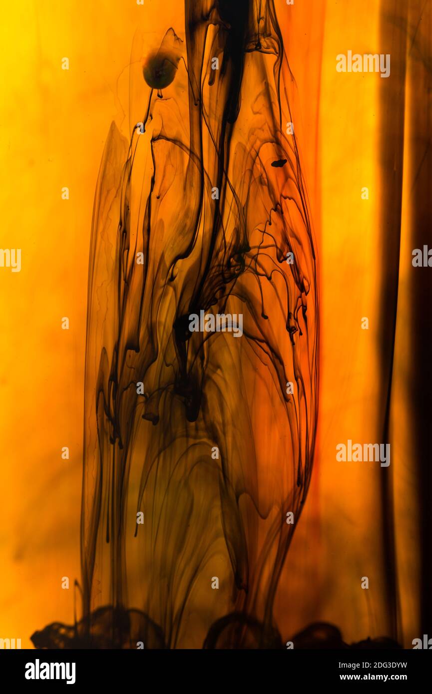 Acrylic colors and ink in water. Abstract background Stock Photo - Alamy