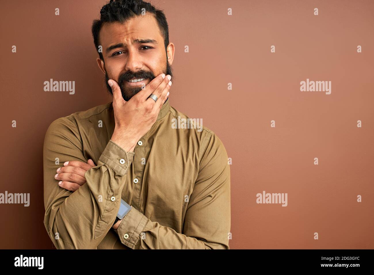 sad arabic man holding face isolated, feeling bad, with disappointed ...