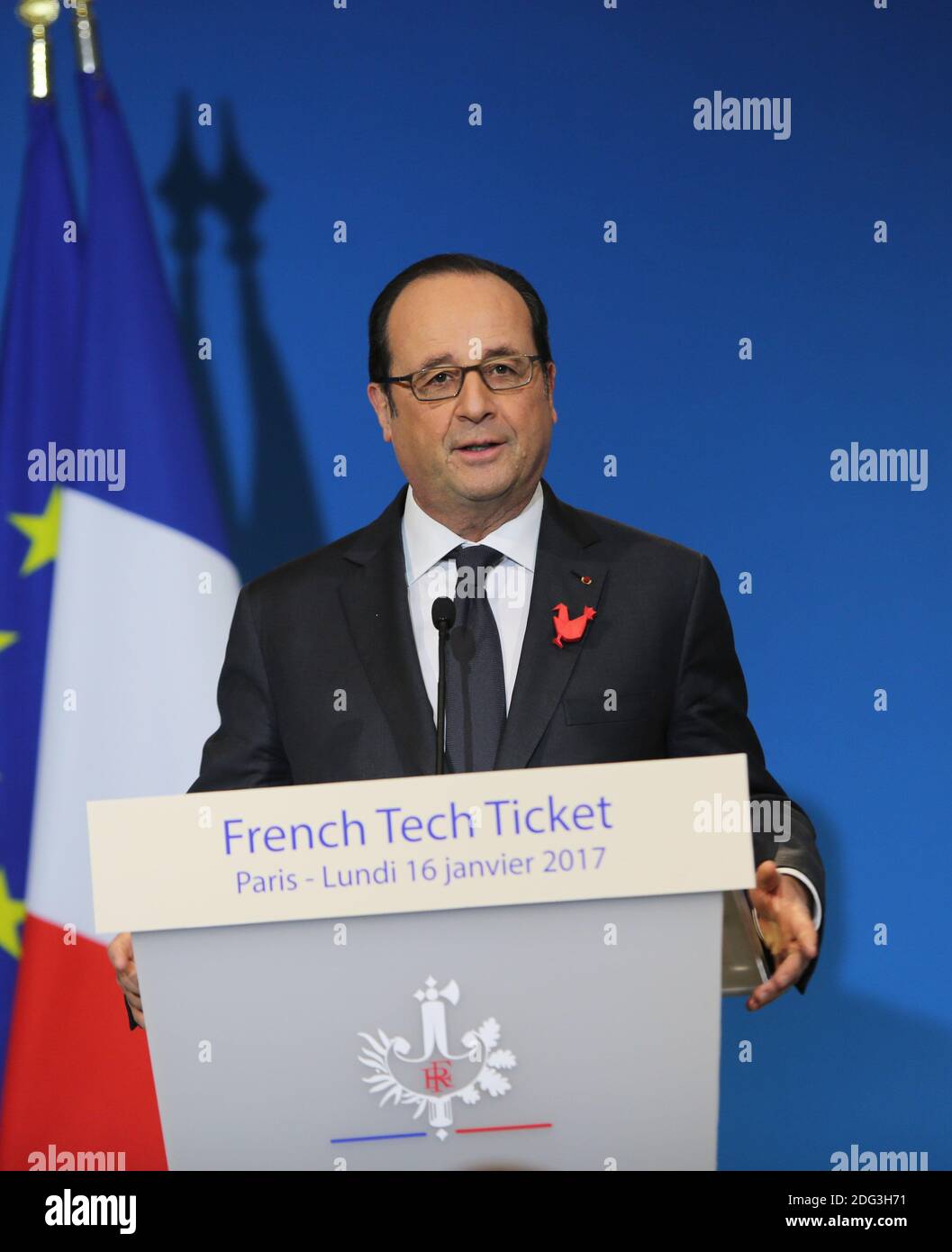 French President Francois Hollande delivers his speech during a ...