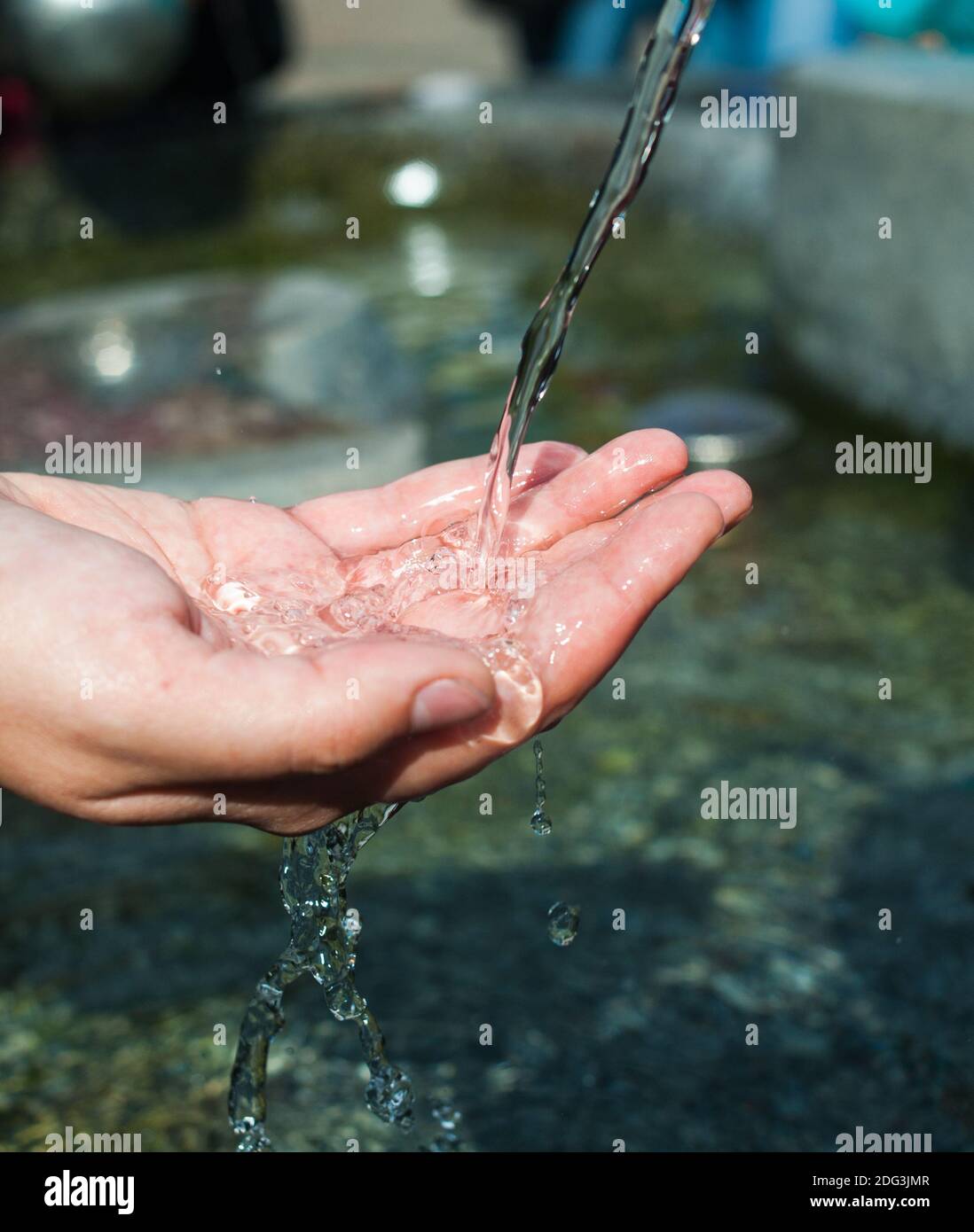 water running to opened female arm closeup under sunlight Stock Photo ...