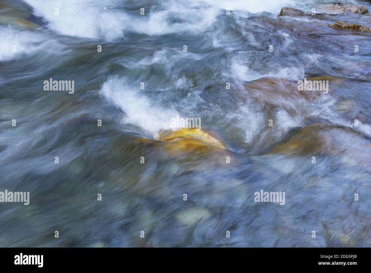 White water flowing over stone, Zillertal Valley Stock Photo - Alamy