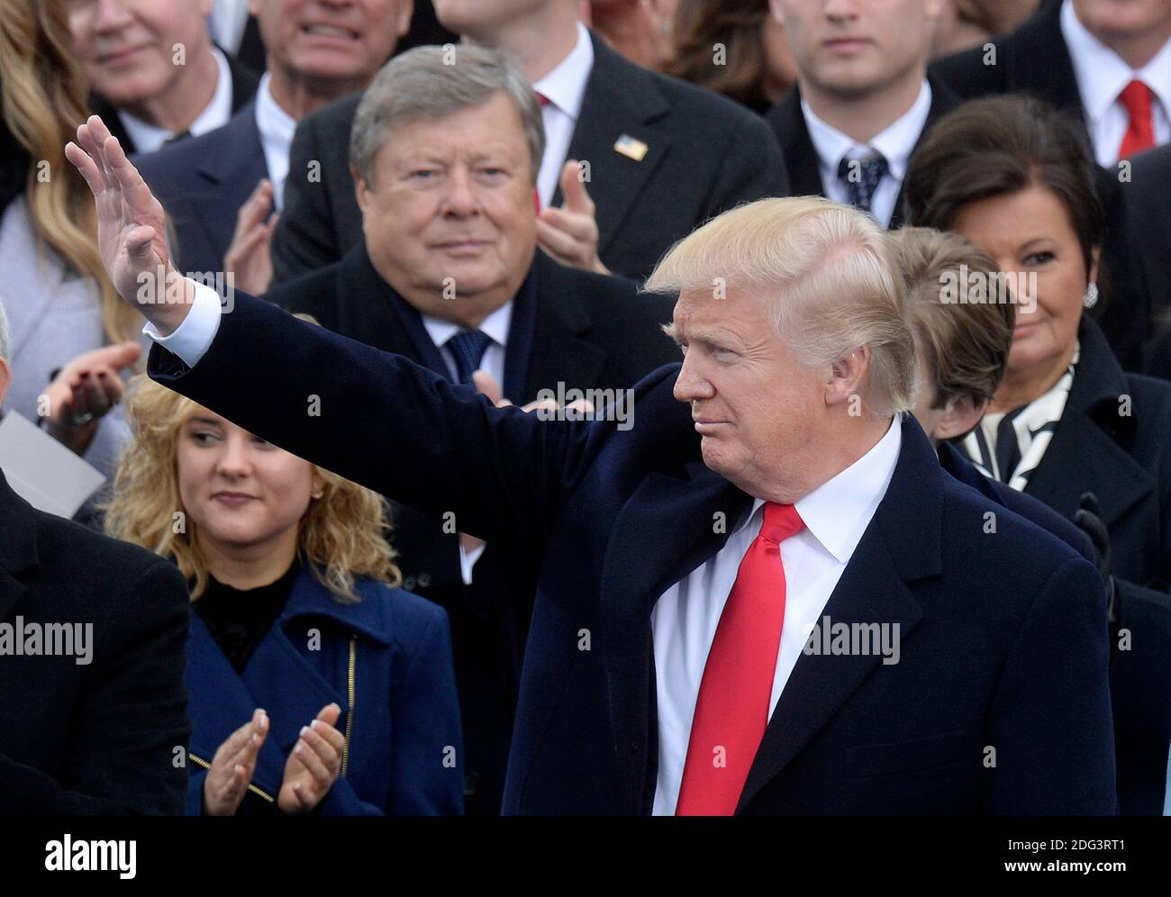 President Donald Trump waves during the 58th Presidential Inauguration ...