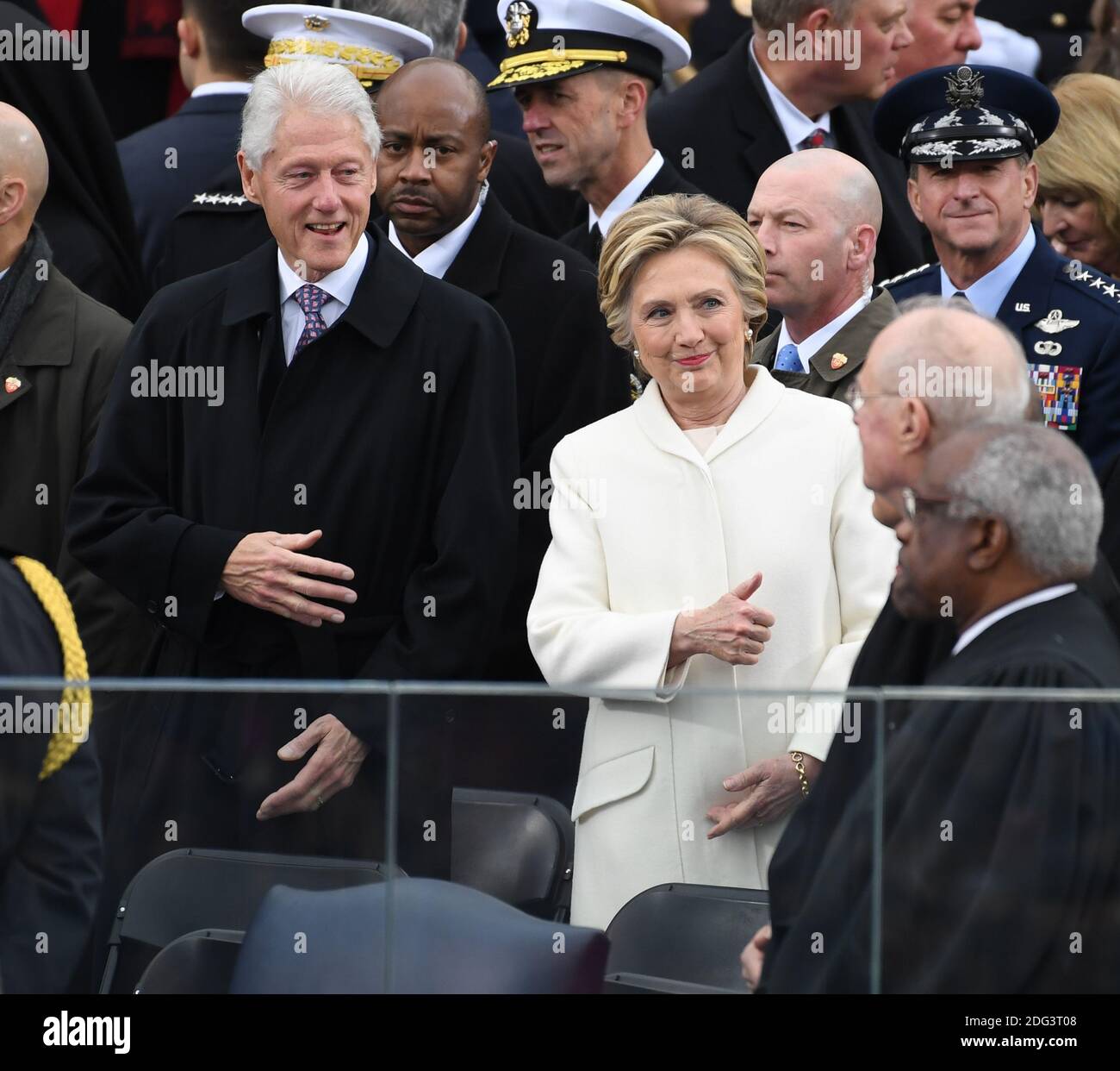 Former President Bill Clinton (L) and Hillary Clinton greet guests at ...