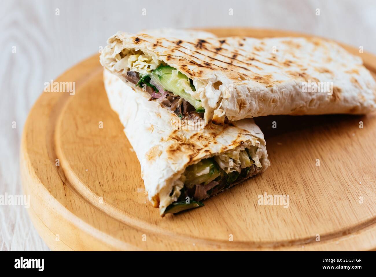 Turkish Shawarma on a wooden Board and light background Stock Photo - Alamy