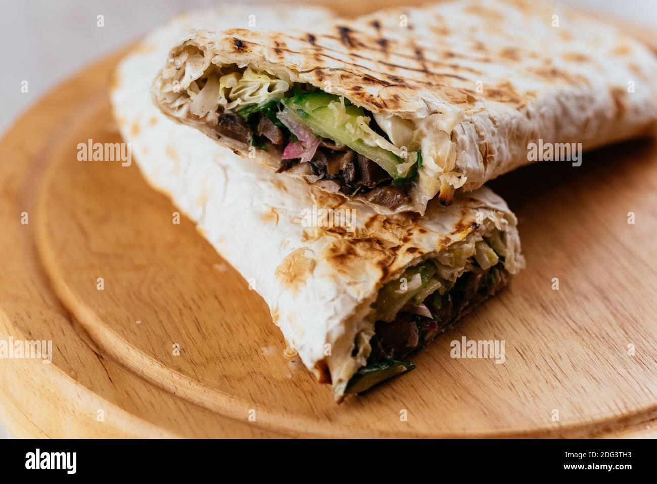 Turkish Shawarma on a wooden Board and light background Stock Photo - Alamy