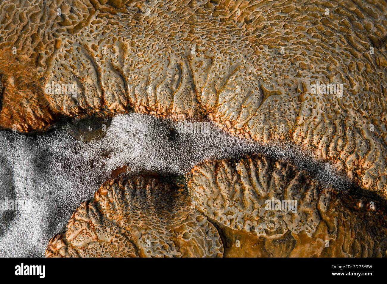 Abstract natural rocky background of the stones with spring water ...