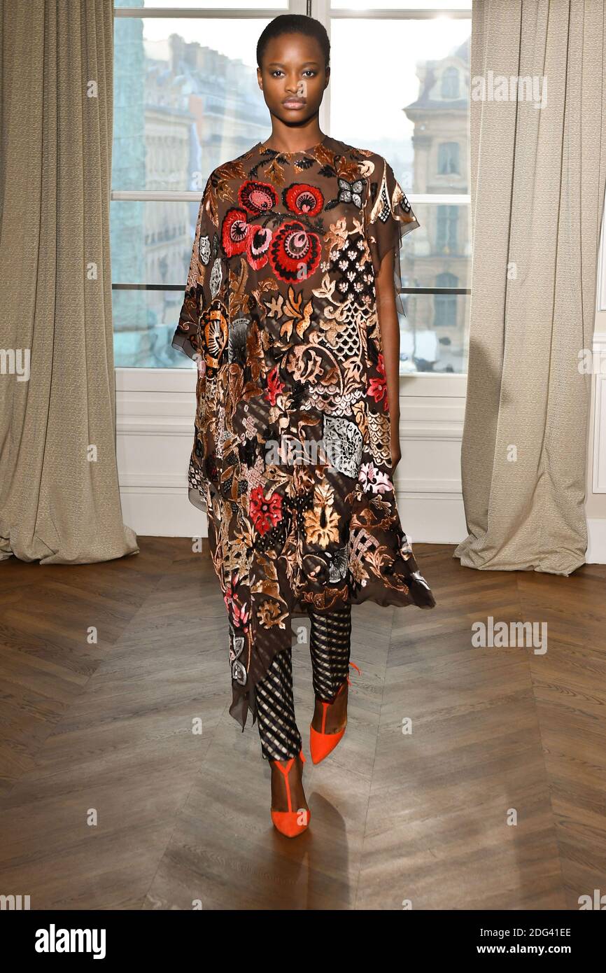 A model walks the runway during the Schiaparelli Haute Couture Spring ...