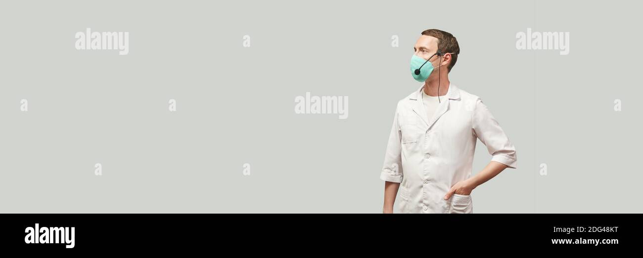 Male doctor with headphones. Studio Medicine portrait Stock Photo - Alamy