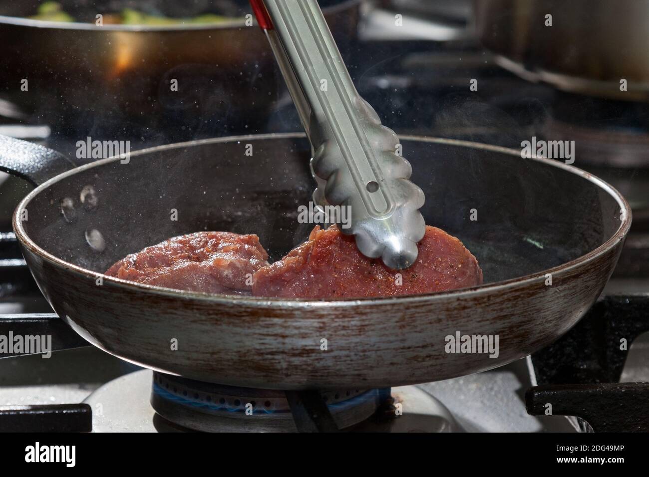 Preparation and cooking of meat Stock Photo - Alamy