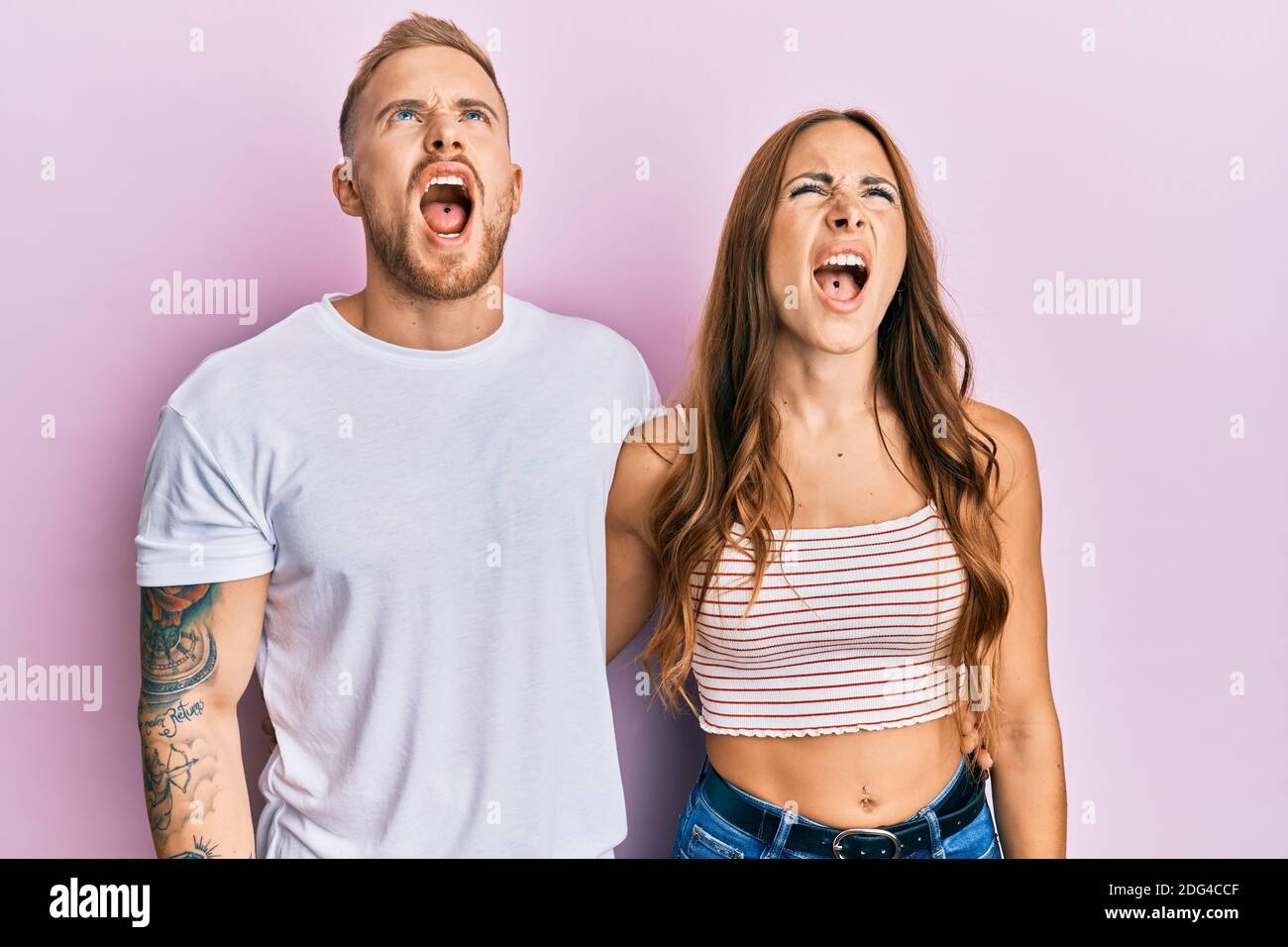 Young couple of girlfriend and boyfriend hugging and standing together ...