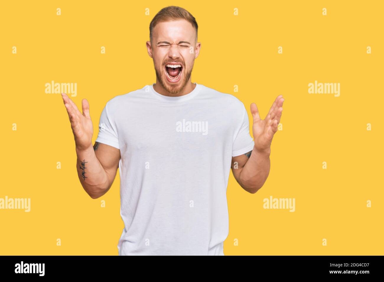 Young irish man wearing casual clothes celebrating mad and crazy for ...