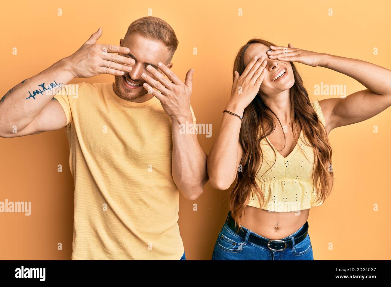 Young couple of girlfriend and boyfriend hugging and standing together ...