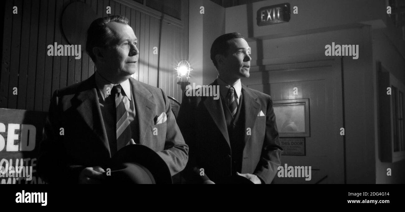 MANK, from left: Gary Oldman as Herman Mankiewicz, Tom Pelphrey as ... MANK, from left: Gary Oldman as Herman Mankiewicz, Tom Pelphrey as ...