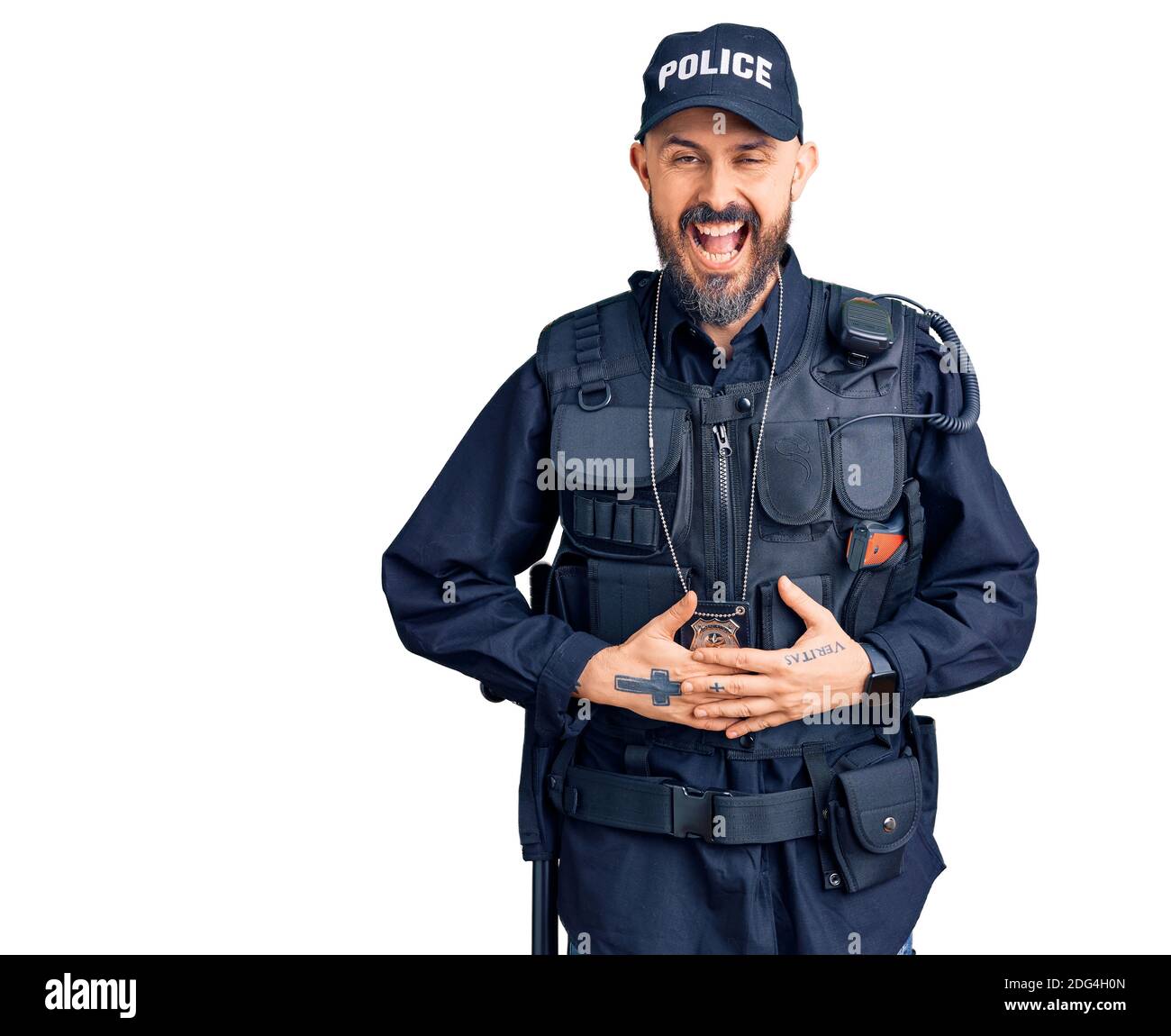 Young handsome man wearing police uniform smiling and laughing hard out ...