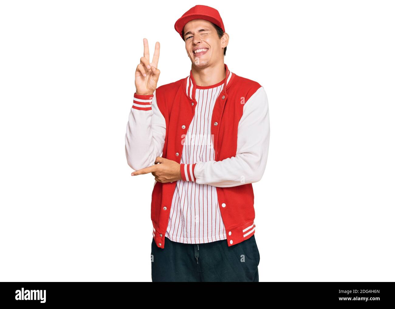 Handsome caucasian man wearing baseball uniform smiling with happy face ...